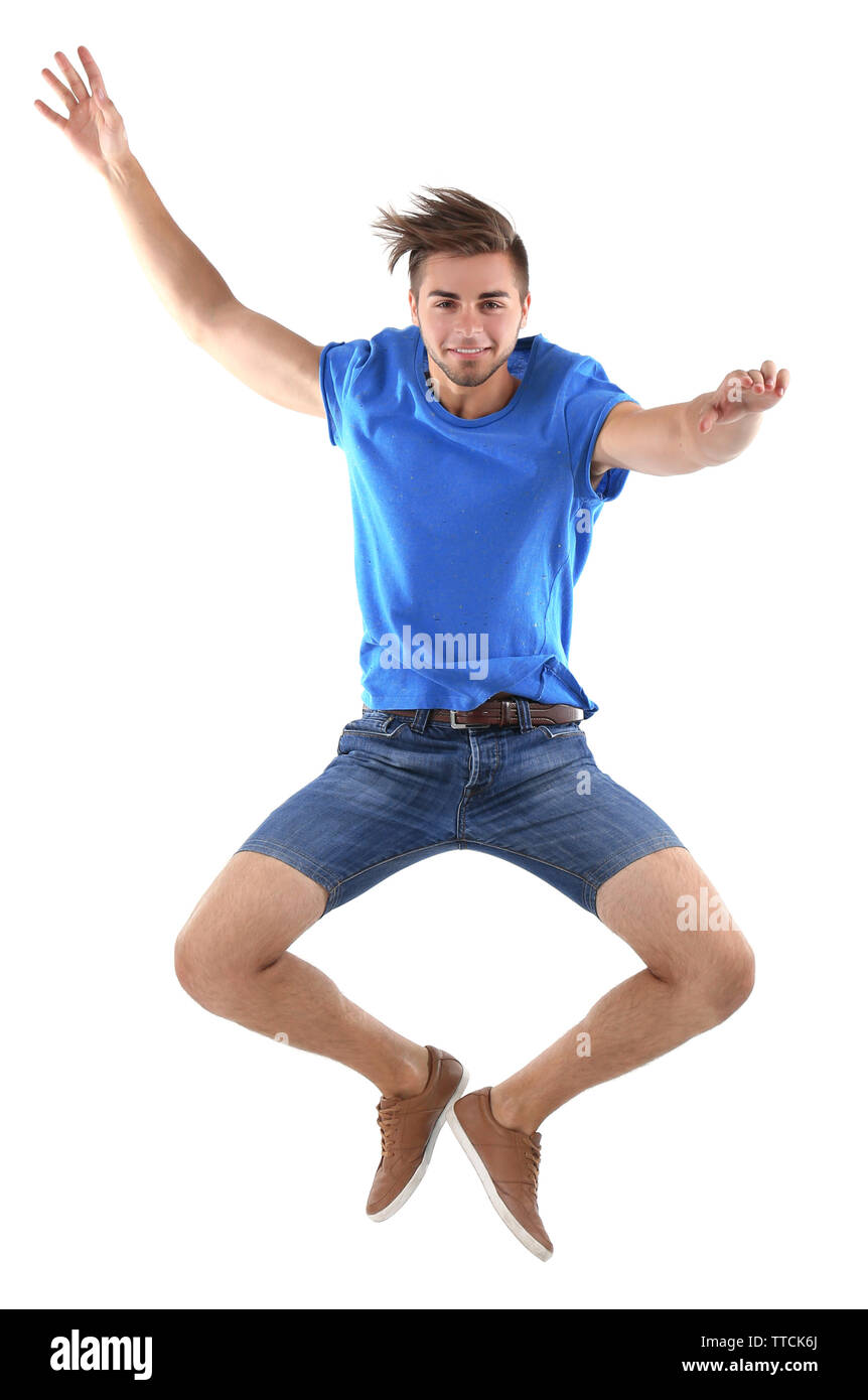 Active guy jumping in joy, isolated on white Stock Photo - Alamy