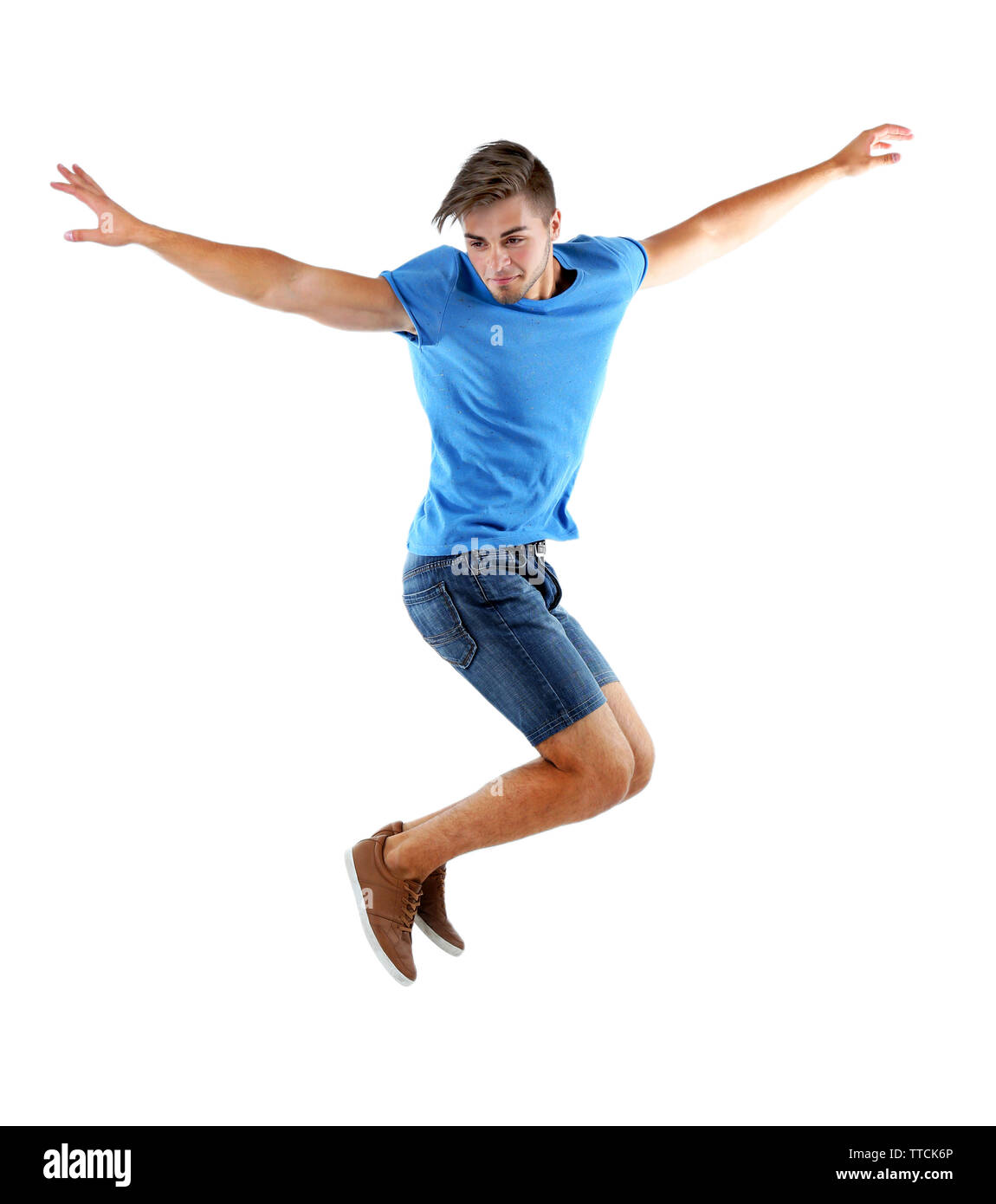 Active guy jumping in joy, isolated on white Stock Photo - Alamy