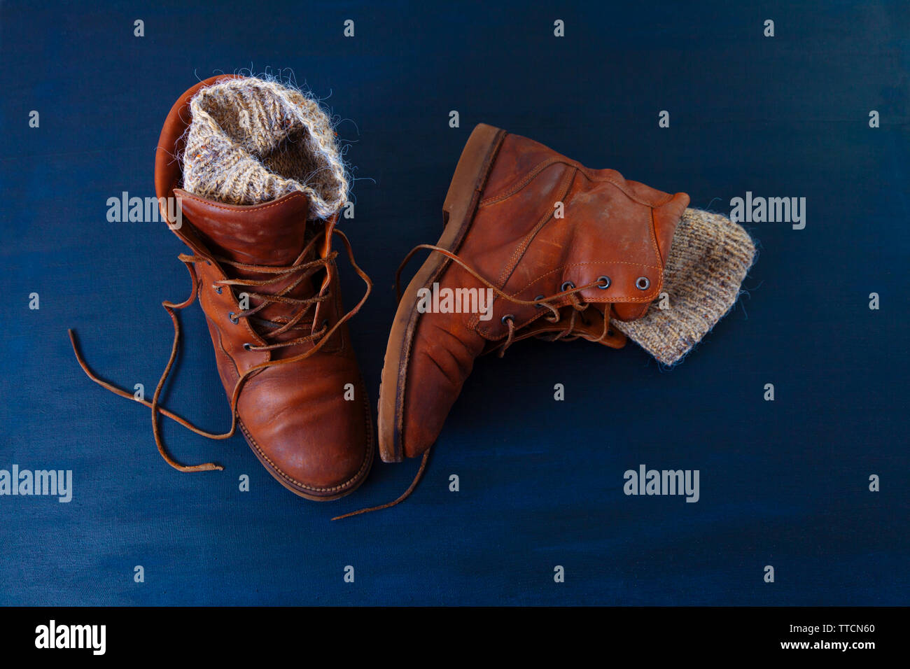 Old red dirty high shoes on blue background. Old school vintage worn ...