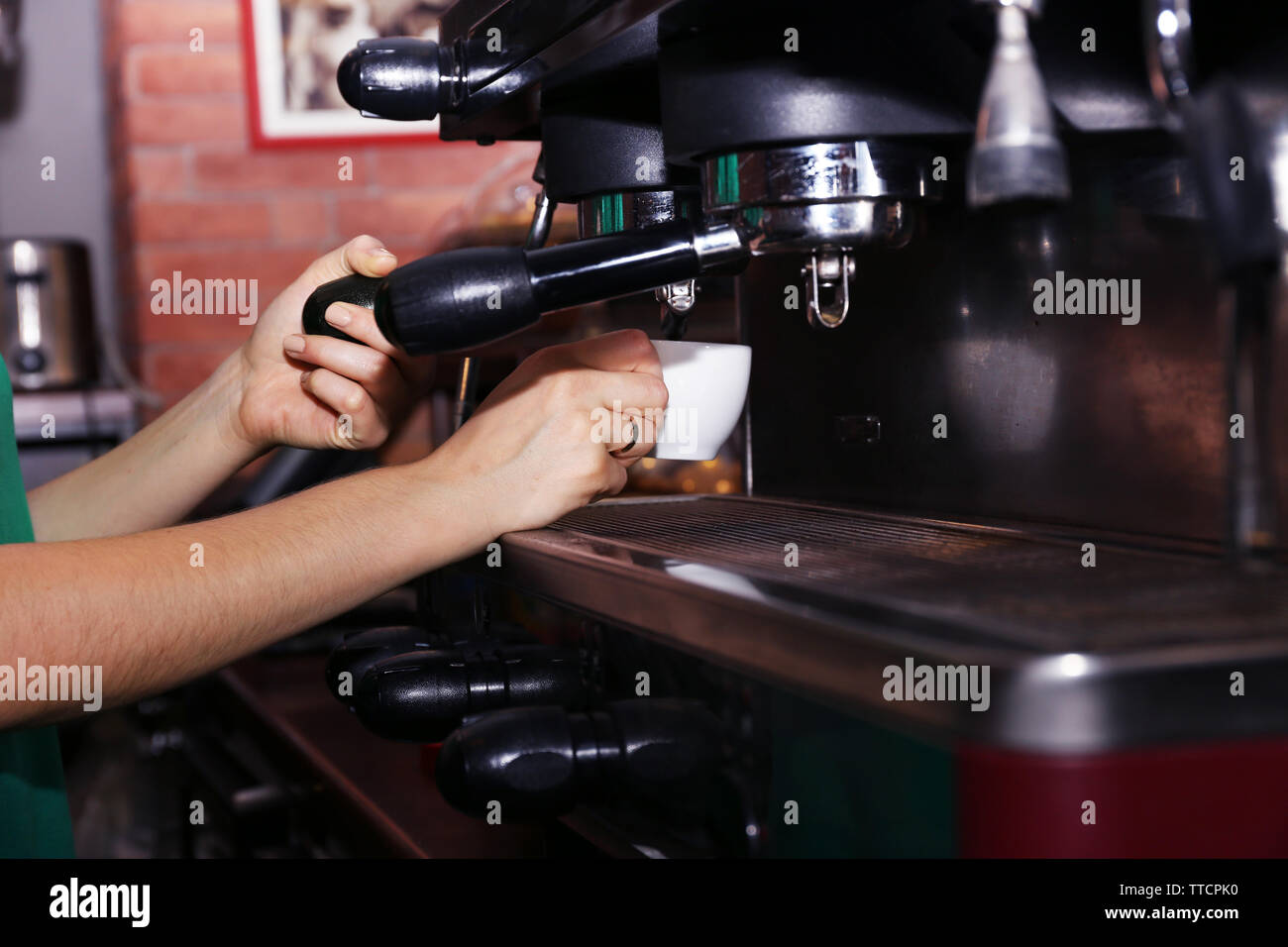 Fresh coffee making in the professional coffee machine, close up Stock ...