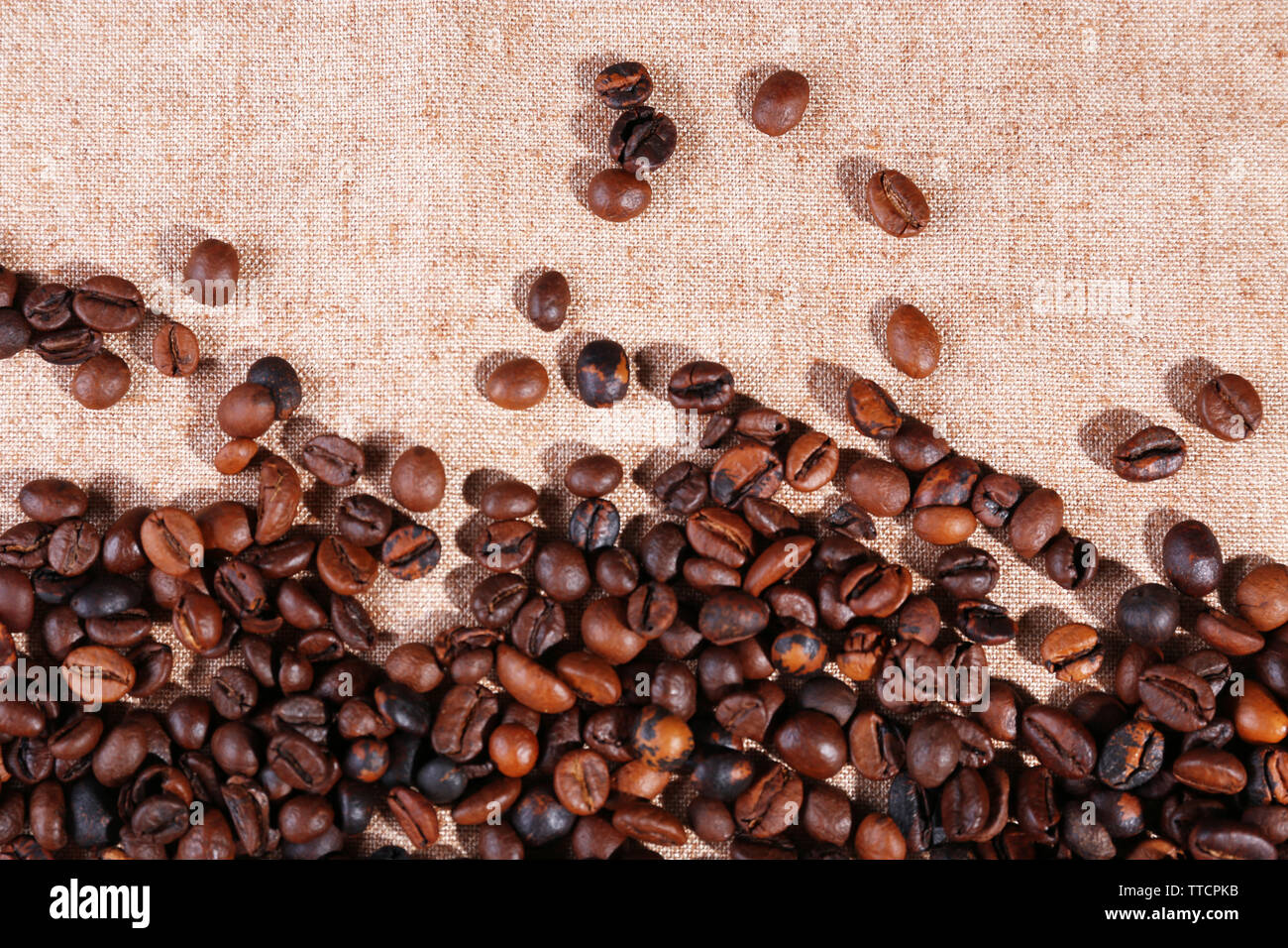 Roasted coffee beans on the linen fabric Stock Photo - Alamy