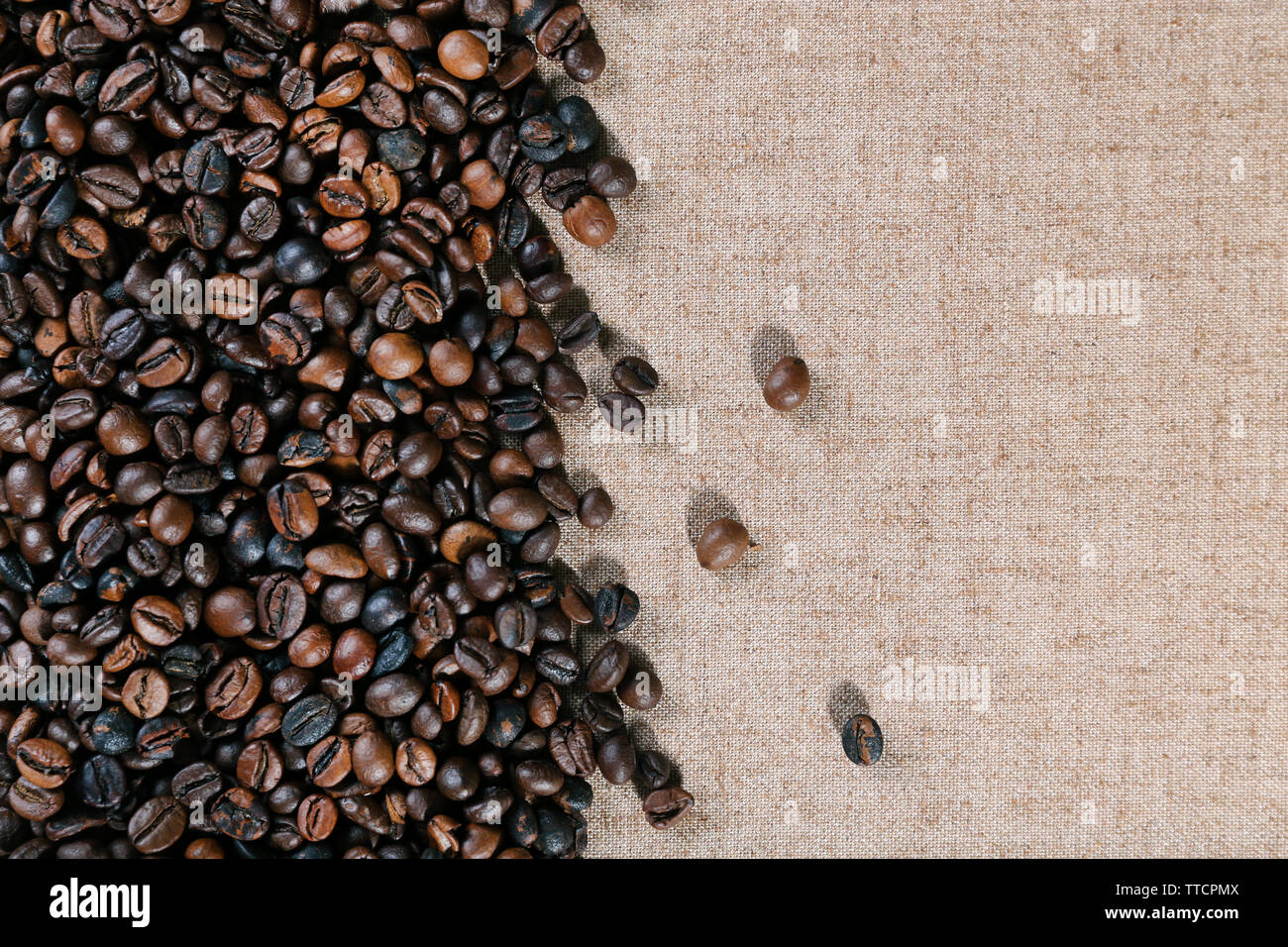 Roasted coffee beans on the linen fabric Stock Photo - Alamy