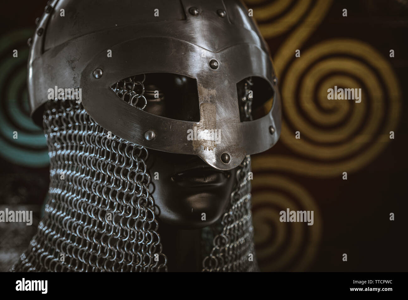 Costume Vikings, viking helmet with chain mail on a red shield with ...