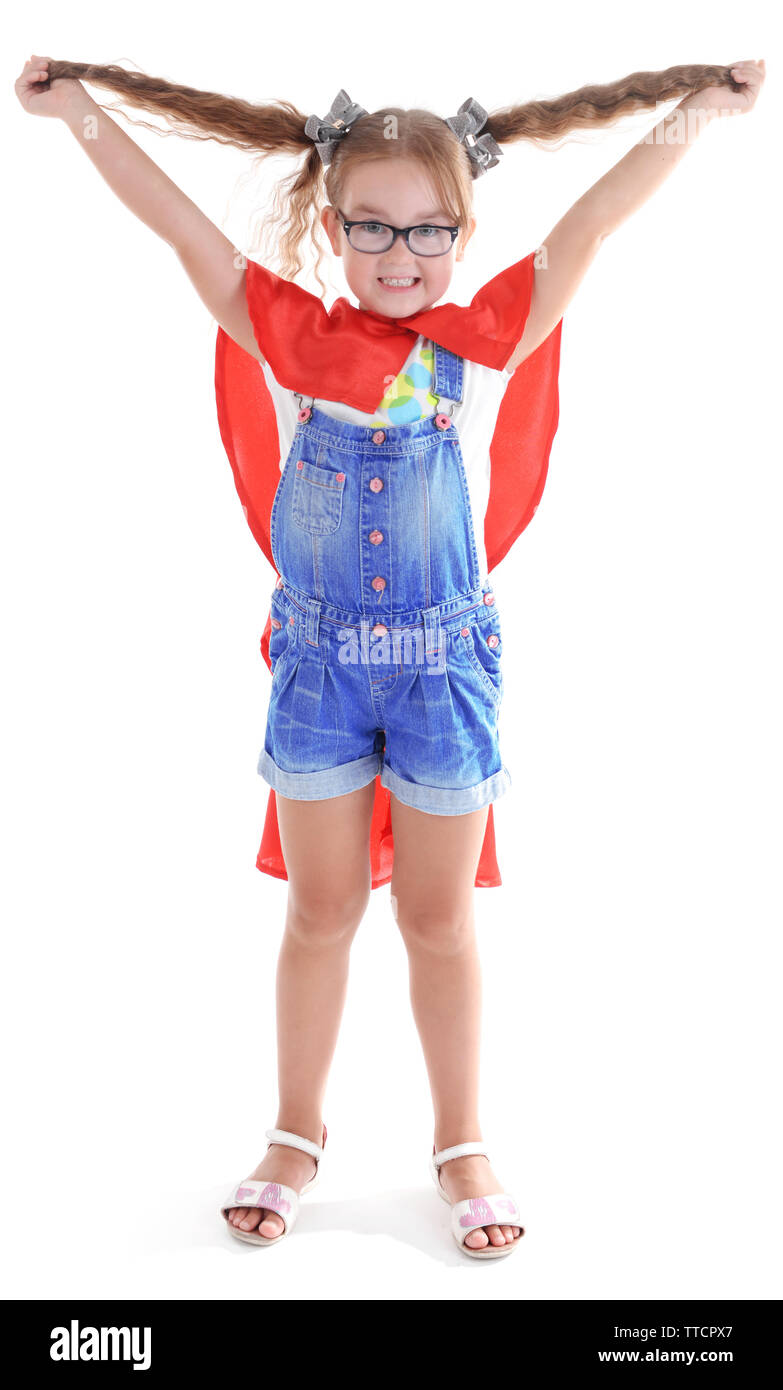 Fancy superhero girl poses on white background Stock Photo - Alamy