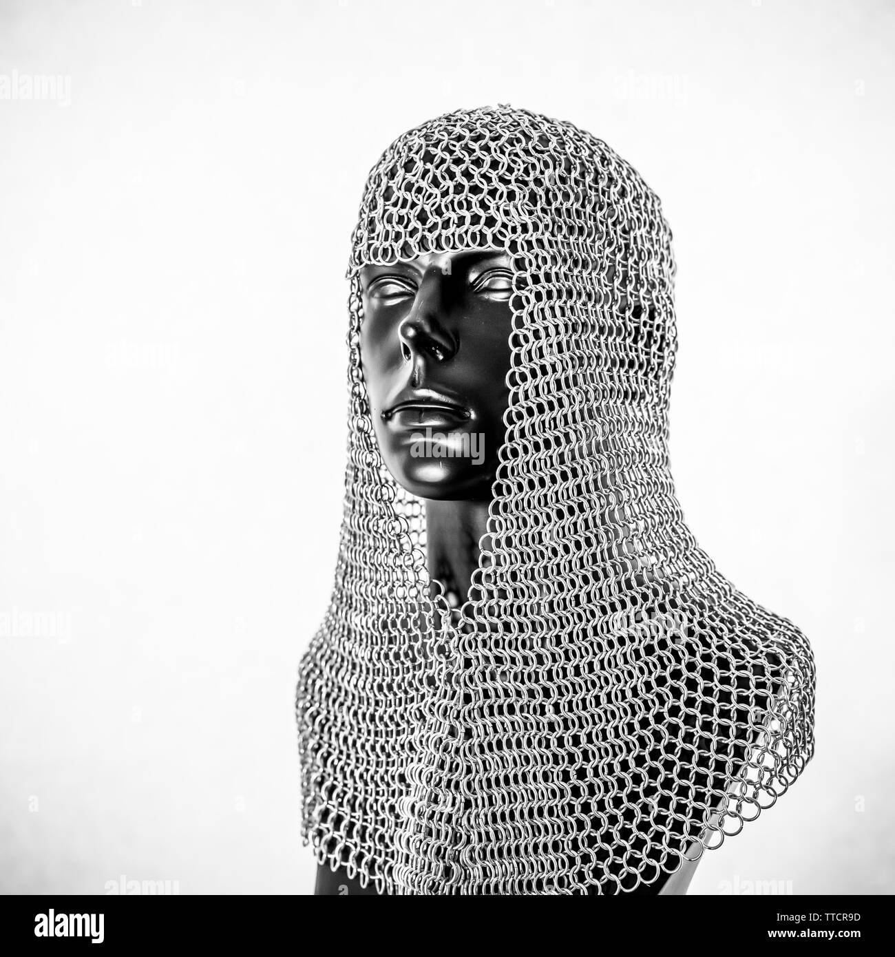 Metal, Viking helmet with chain mail in a black mannequin on white ...