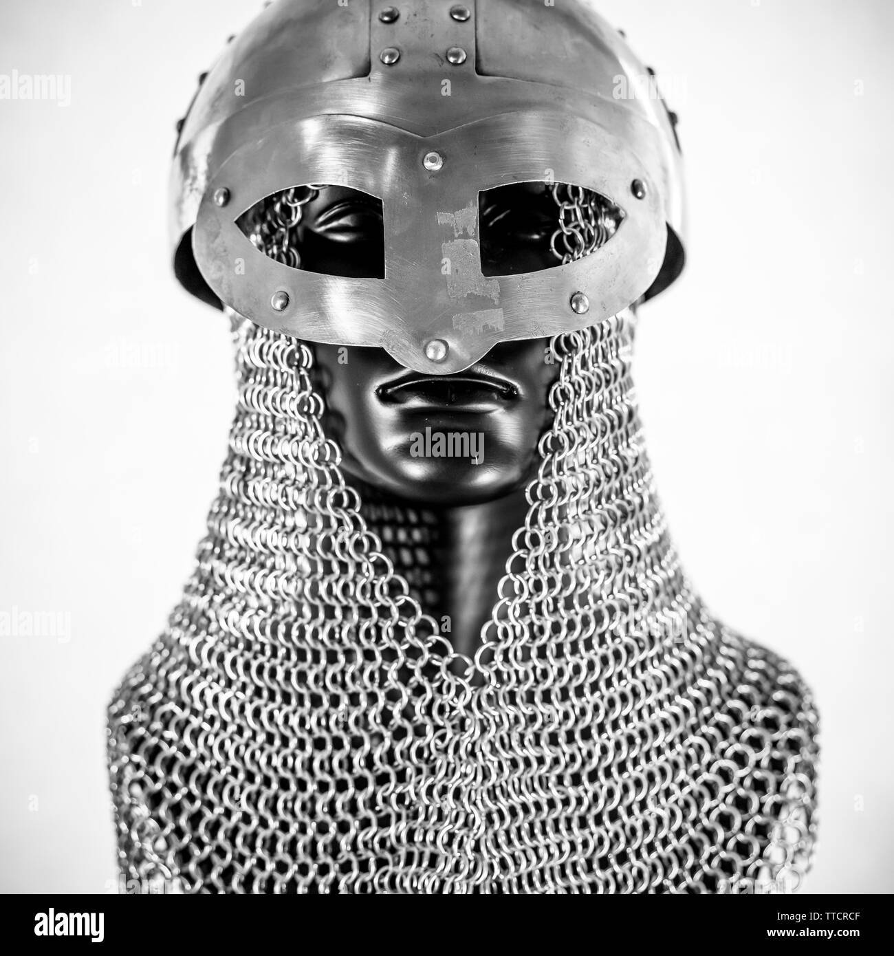 Metal, Viking helmet with chain mail in a black mannequin on white ...