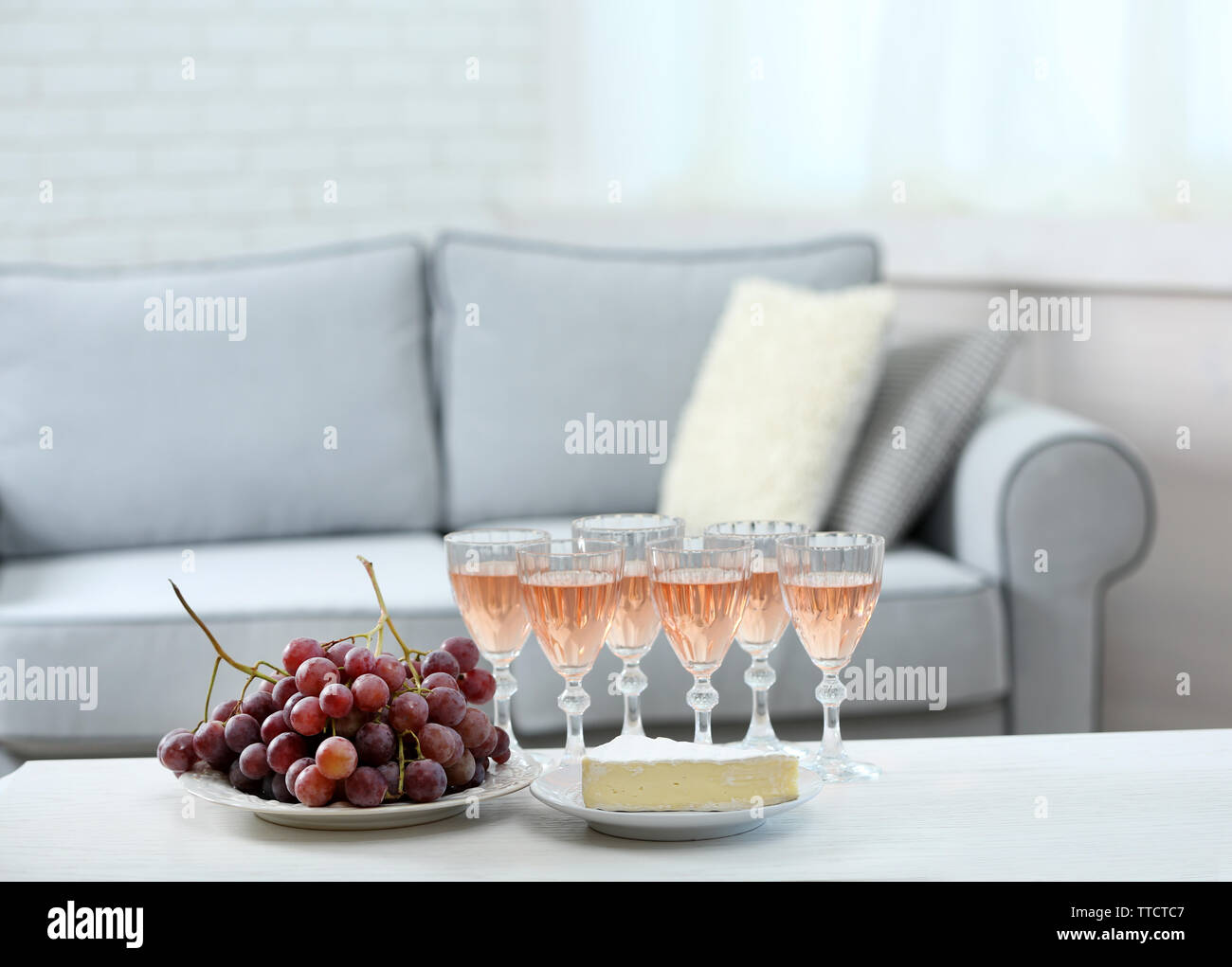 Table at home with food and drinks for friends Stock Photo - Alamy