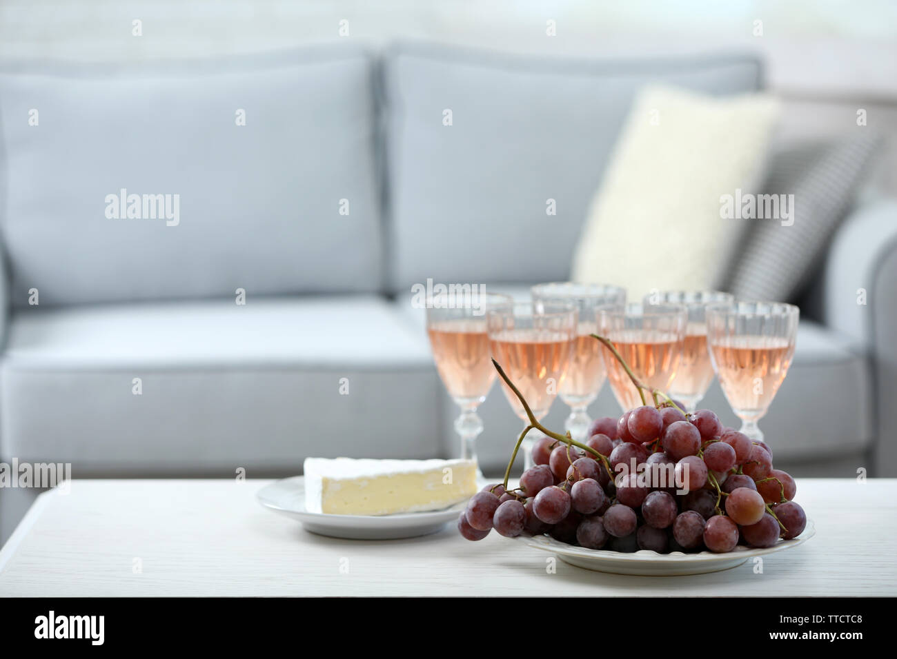 Table at home with food and drinks for friends Stock Photo - Alamy
