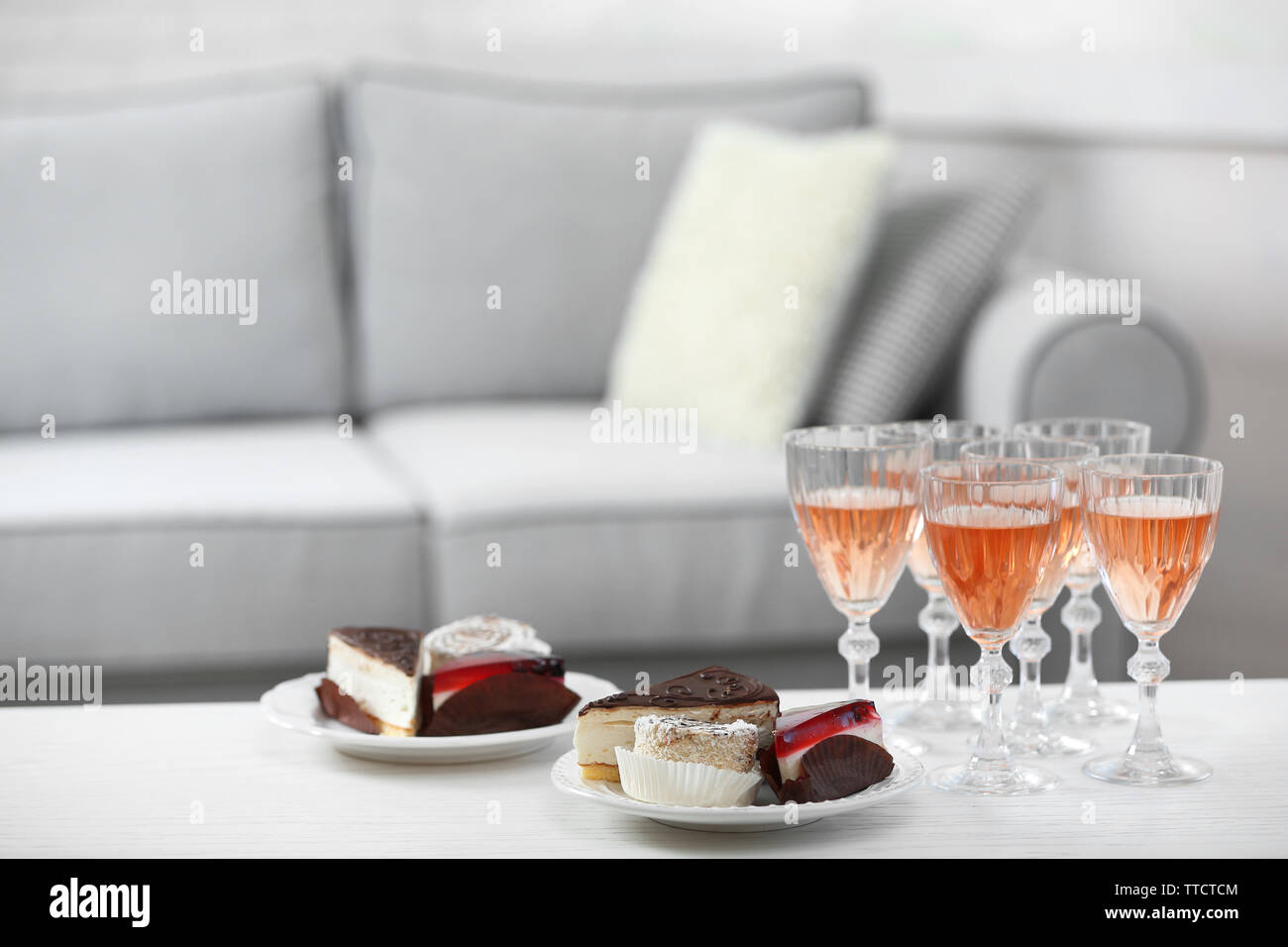 Table at home with food and drinks for friends Stock Photo - Alamy
