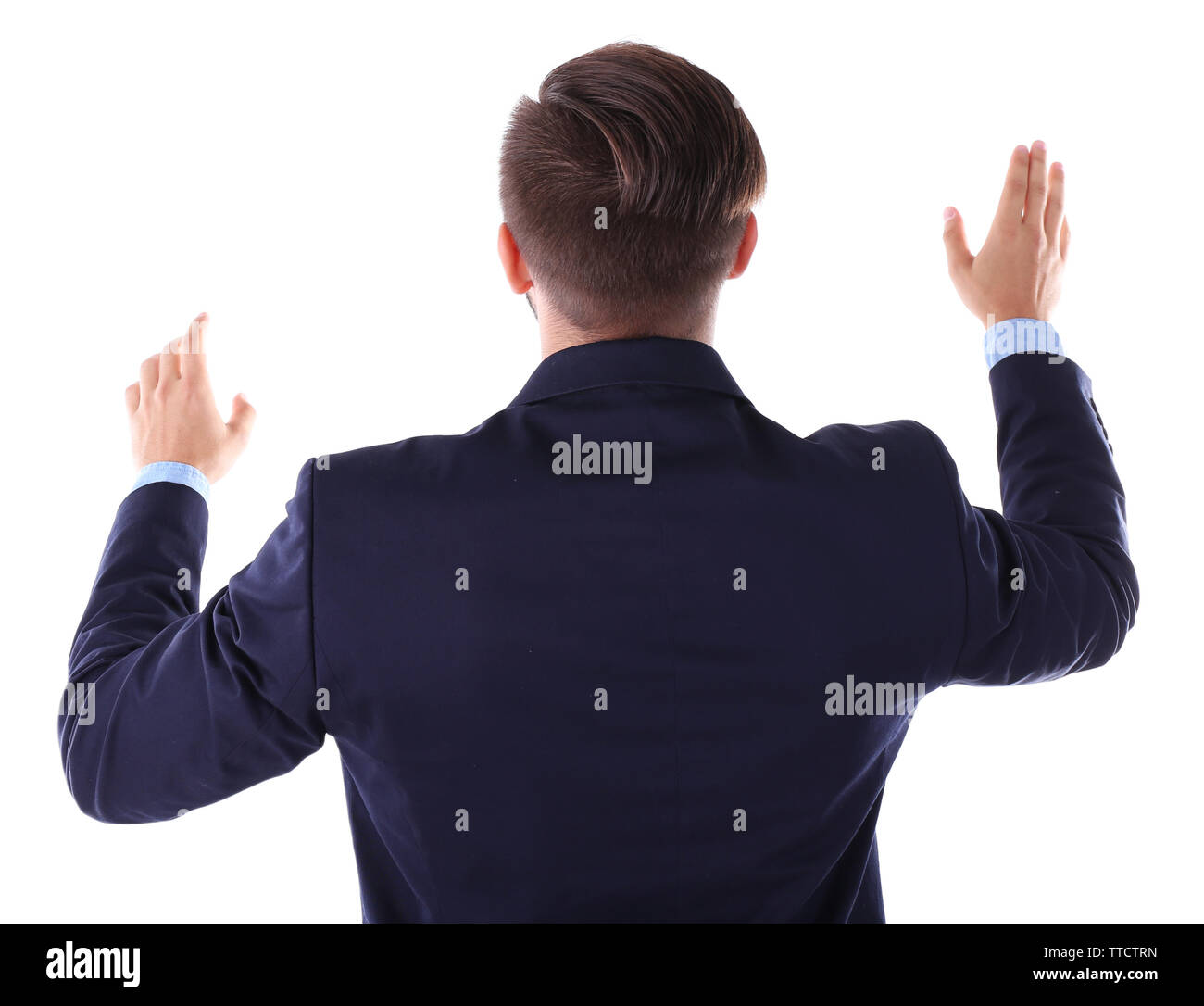 Back view of Caucasian young man in navy blue suit pointing, isolated ...