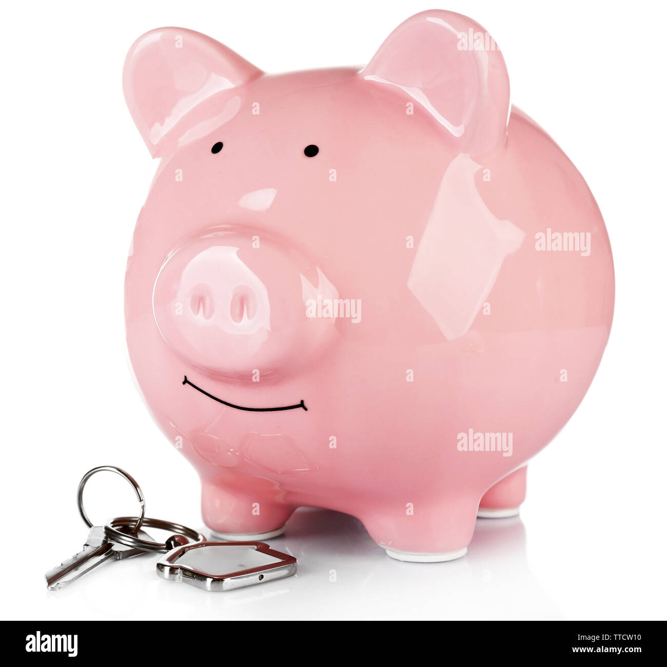 Piggy bank style money box with key isolated on a white Stock Photo - Alamy