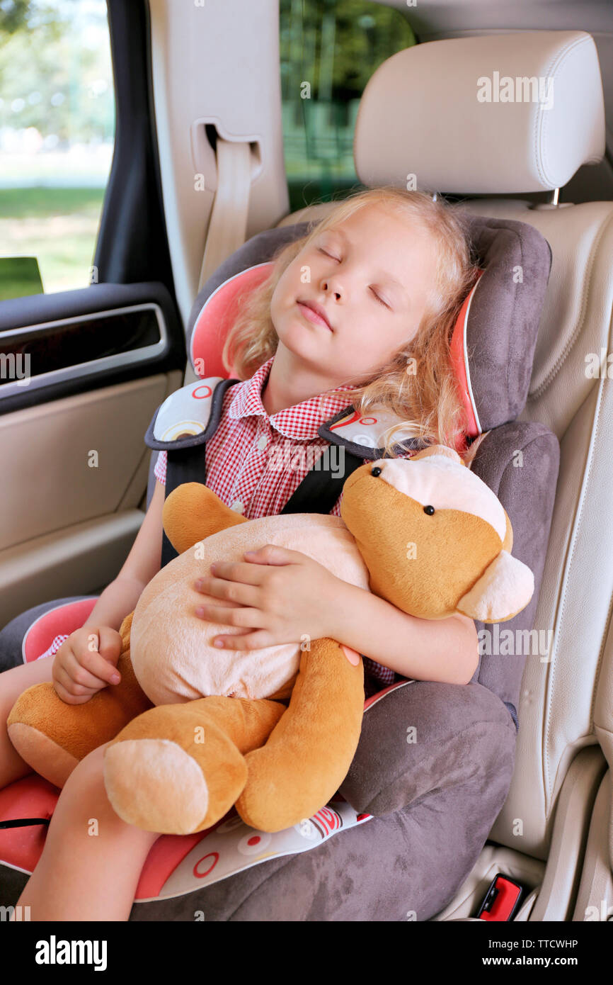 Girl sleeping car seatbelt hi-res stock photography and images - Alamy