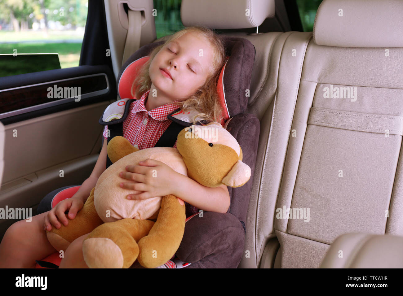 Girl sleeping car seatbelt hi-res stock photography and images - Alamy