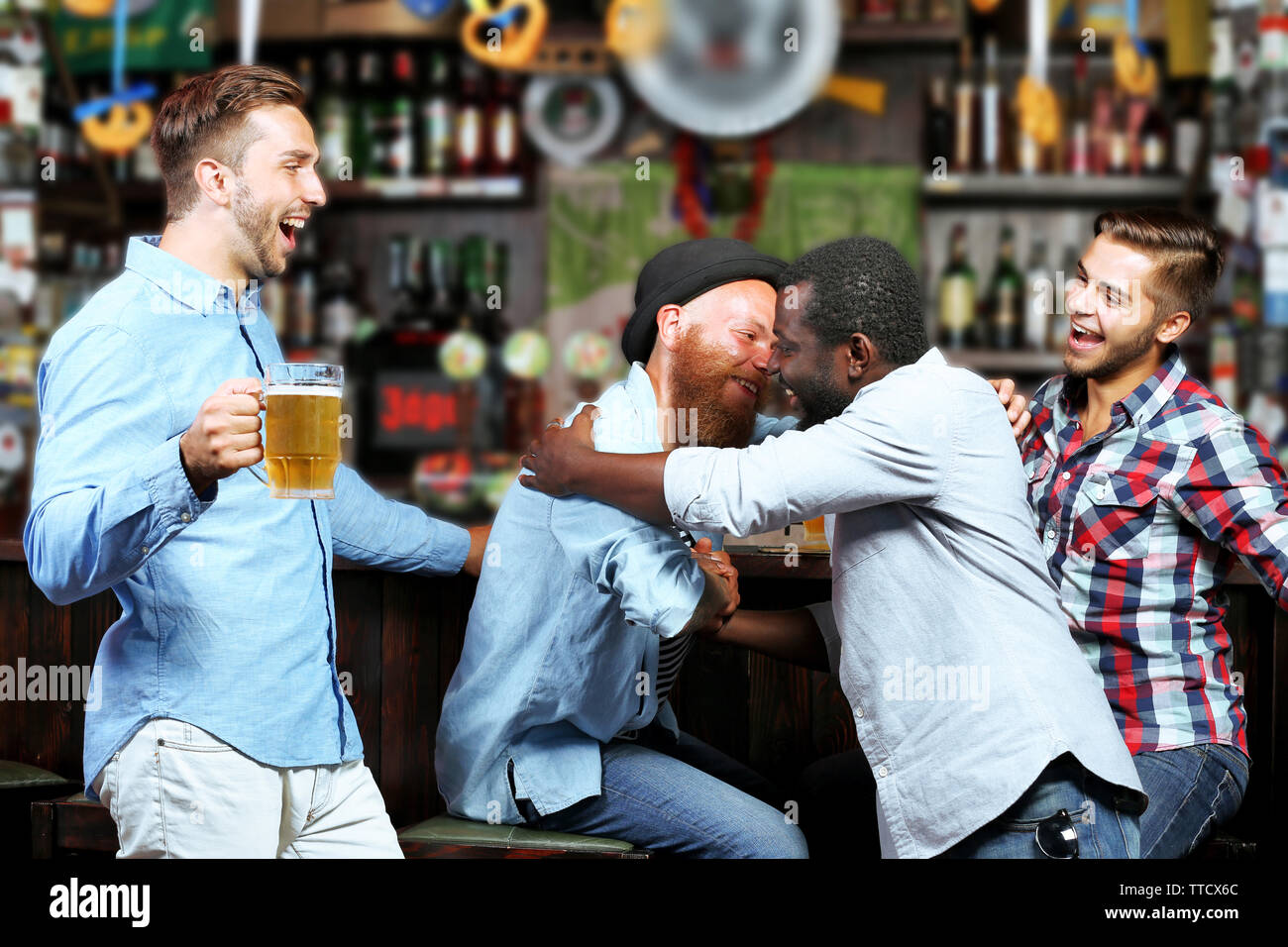 Young people in a bar Stock Photo - Alamy