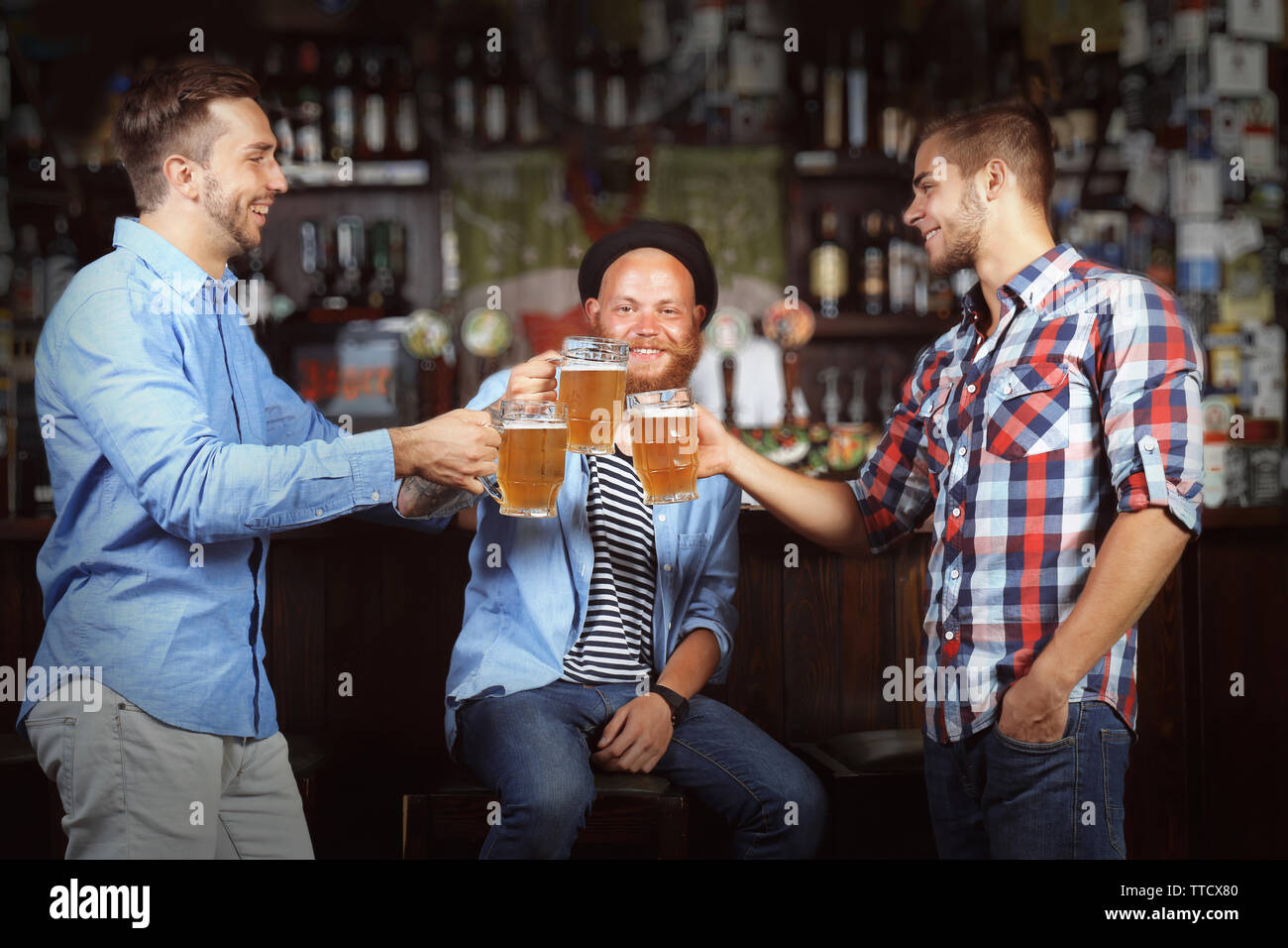 Young people in a bar Stock Photo - Alamy