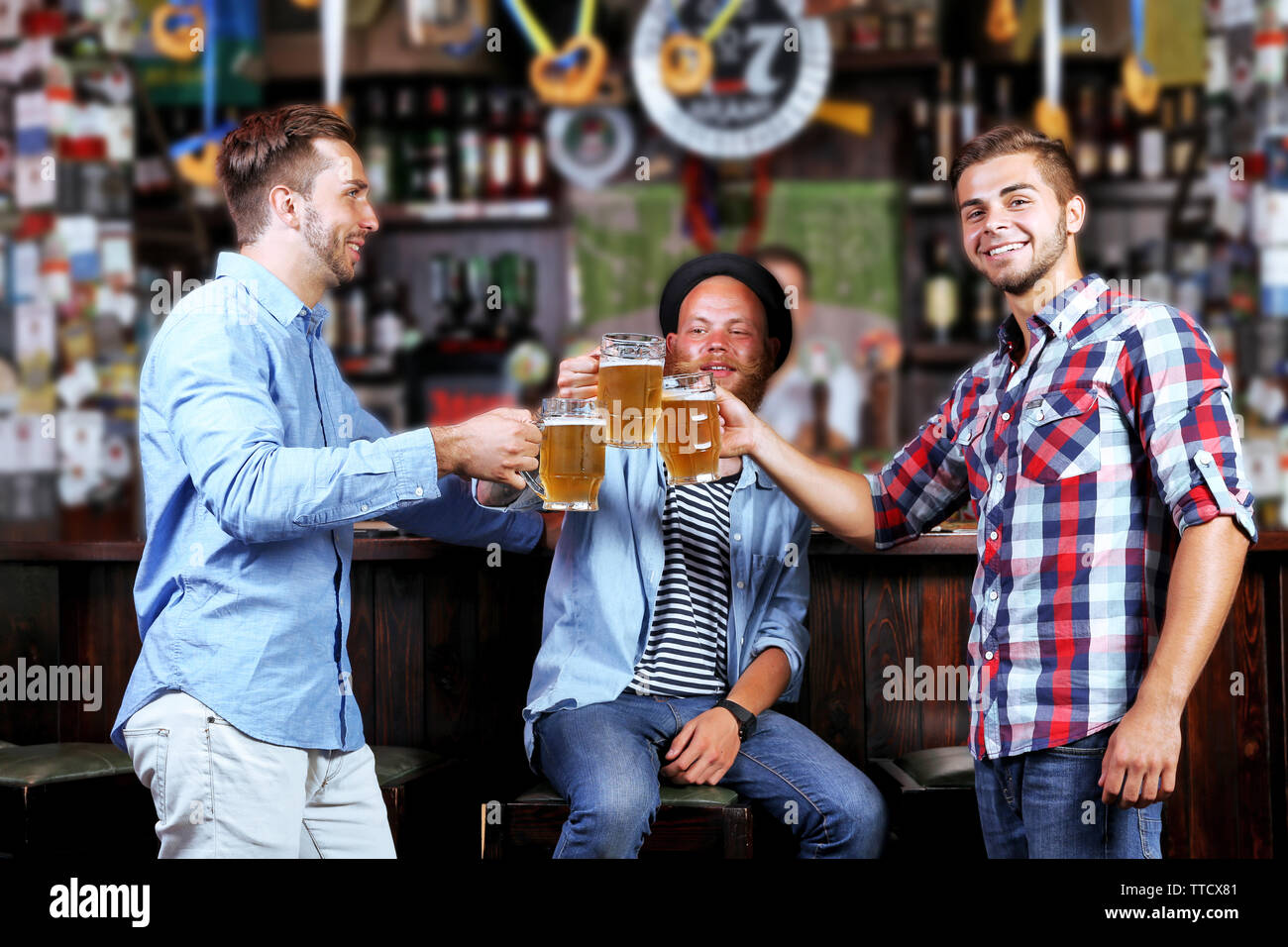 Young people in a bar Stock Photo - Alamy