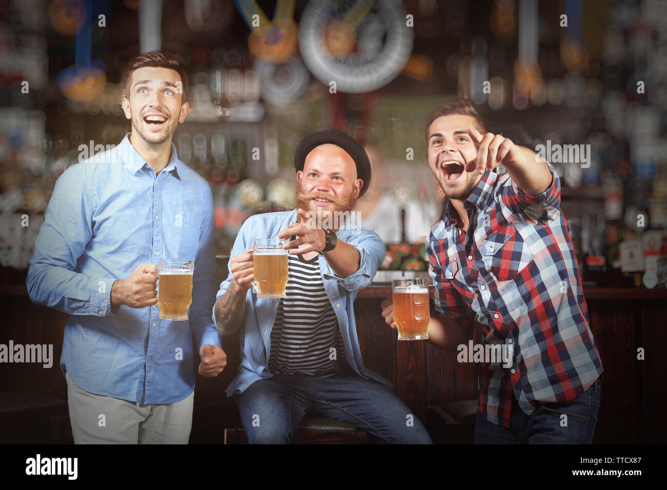 Business people drinking beer rejoice hi-res stock photography and ...