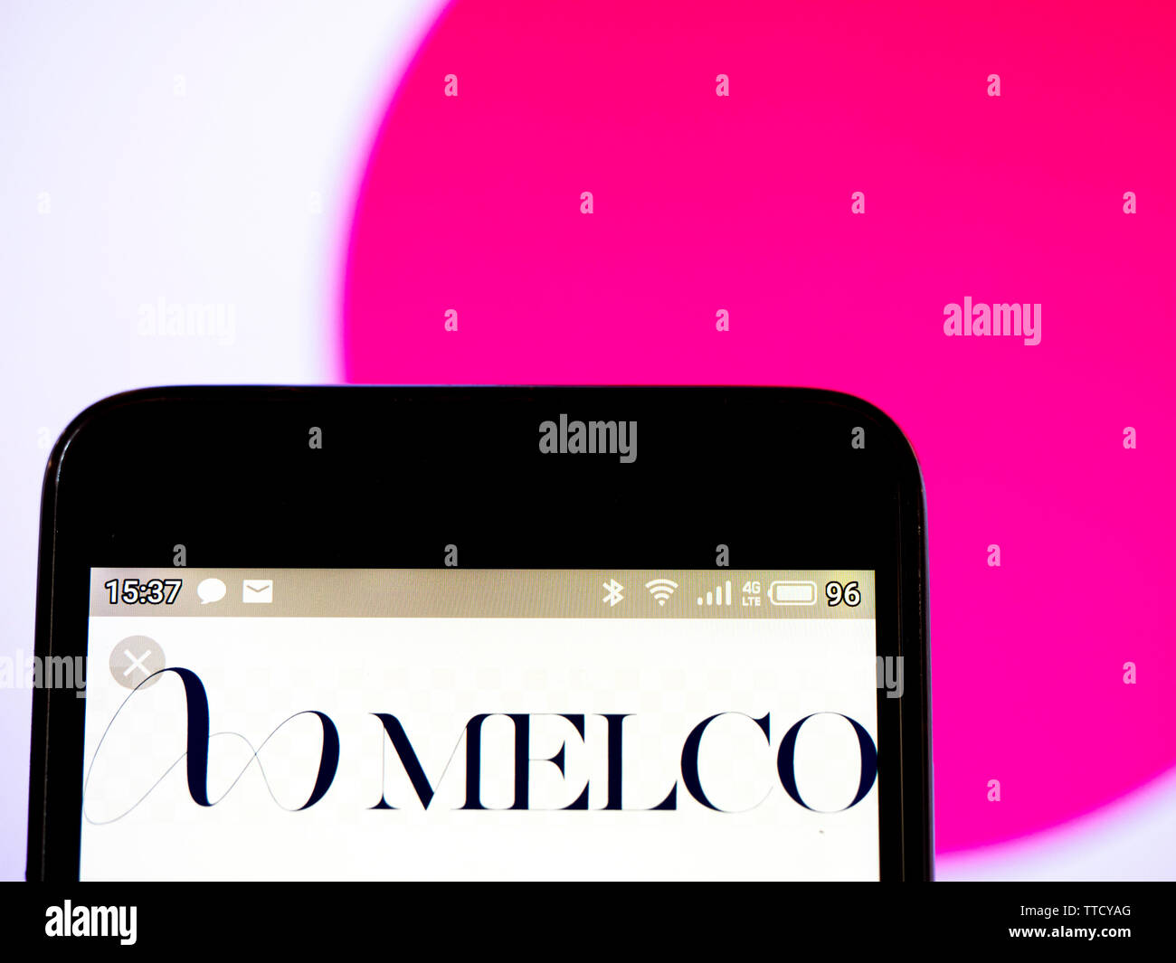 In this photo illustration the Melco Holdings Inc. logo is seen ...