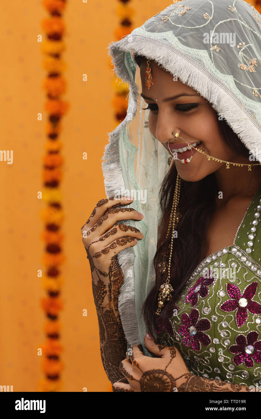 Indian bride smiling Stock Photo - Alamy