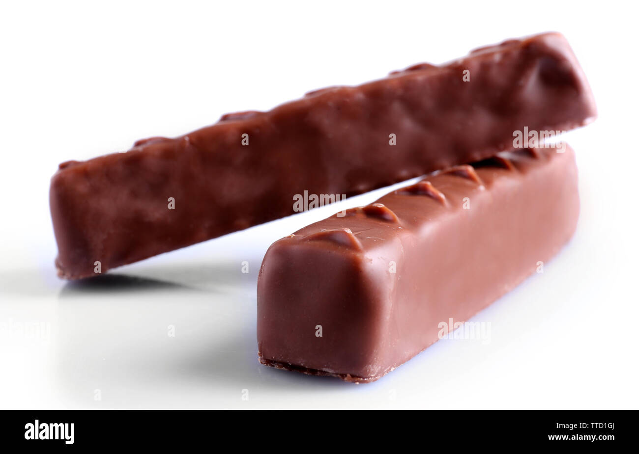 Two chocolate candies, isolated on white Stock Photo - Alamy