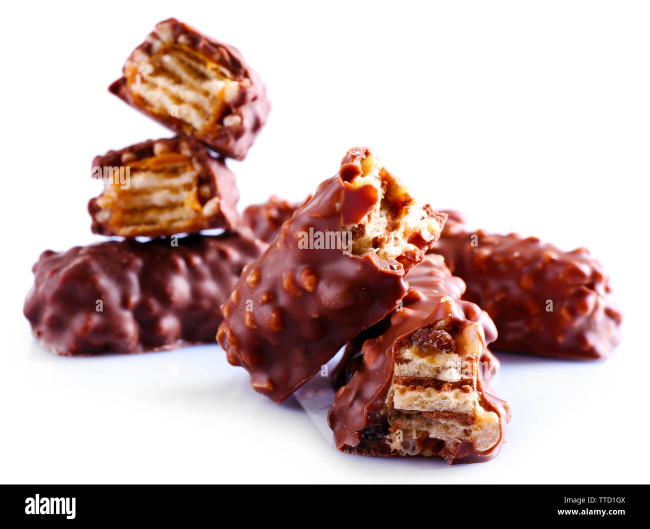 Broken crispy candy bars, isolated on white Stock Photo - Alamy