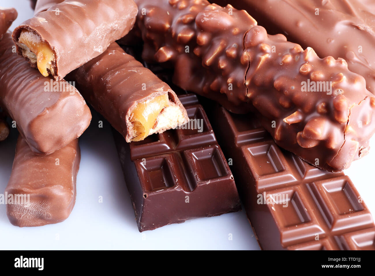 Mix of chocolate bars on table, close-up Stock Photo - Alamy