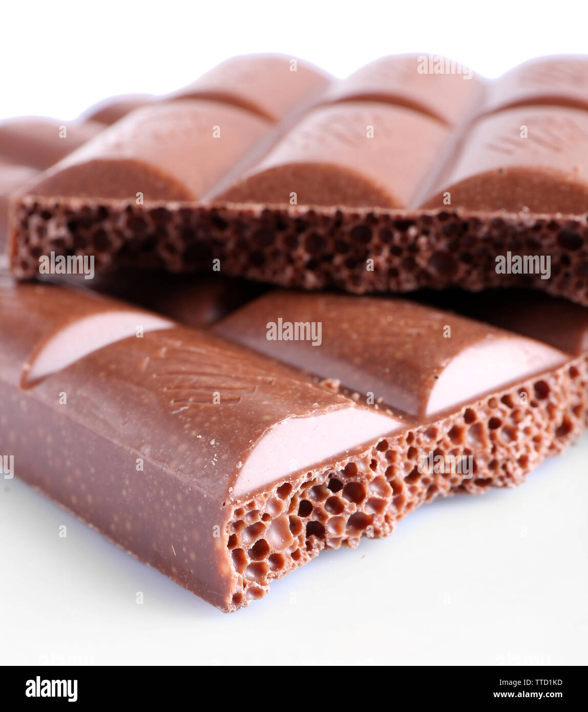 Broken chocolate bar on table Stock Photo - Alamy