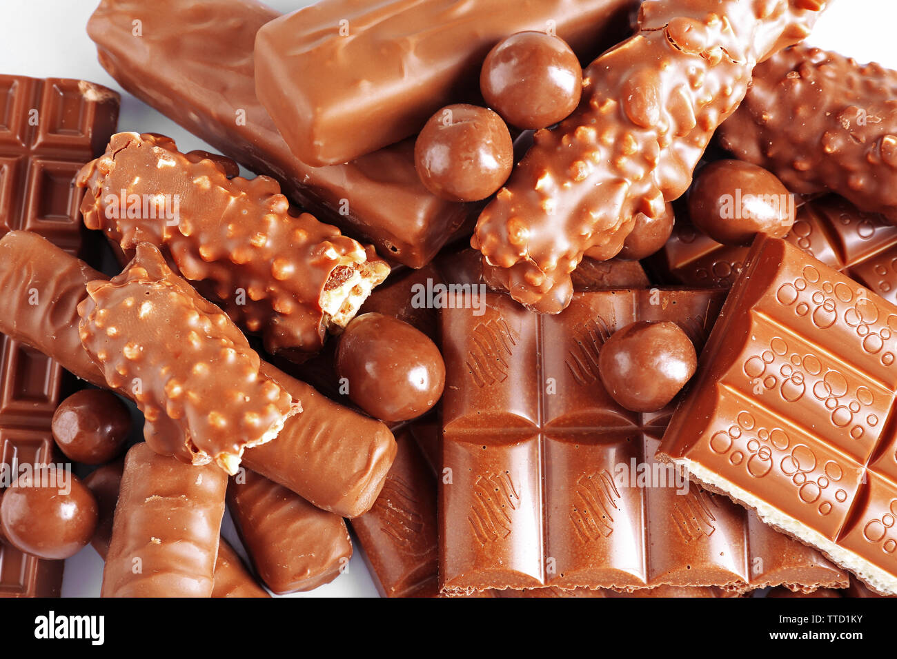Mix of chocolate on table, close-up Stock Photo - Alamy