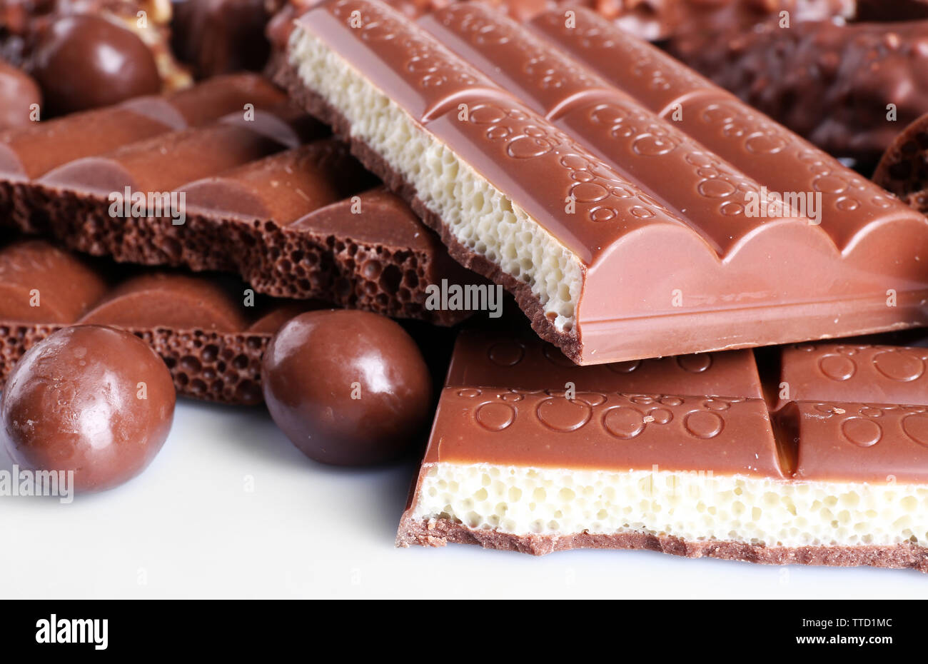 Mix of chocolate on table, close-up Stock Photo - Alamy
