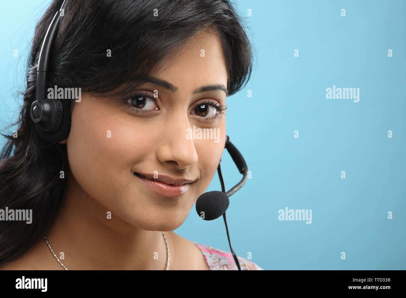 Woman wearing a headset Stock Photo - Alamy