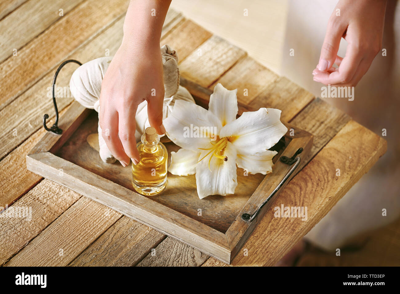 Female hands with tray of spa products, at spa salon Stock Photo - Alamy