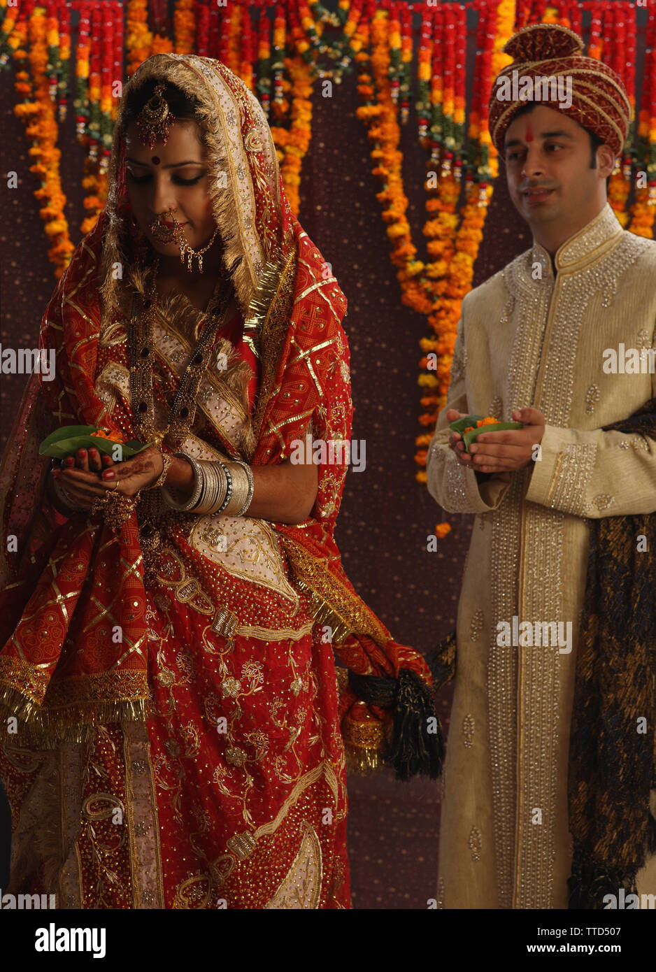 Indian bride groom performing ritual hi-res stock photography and ...