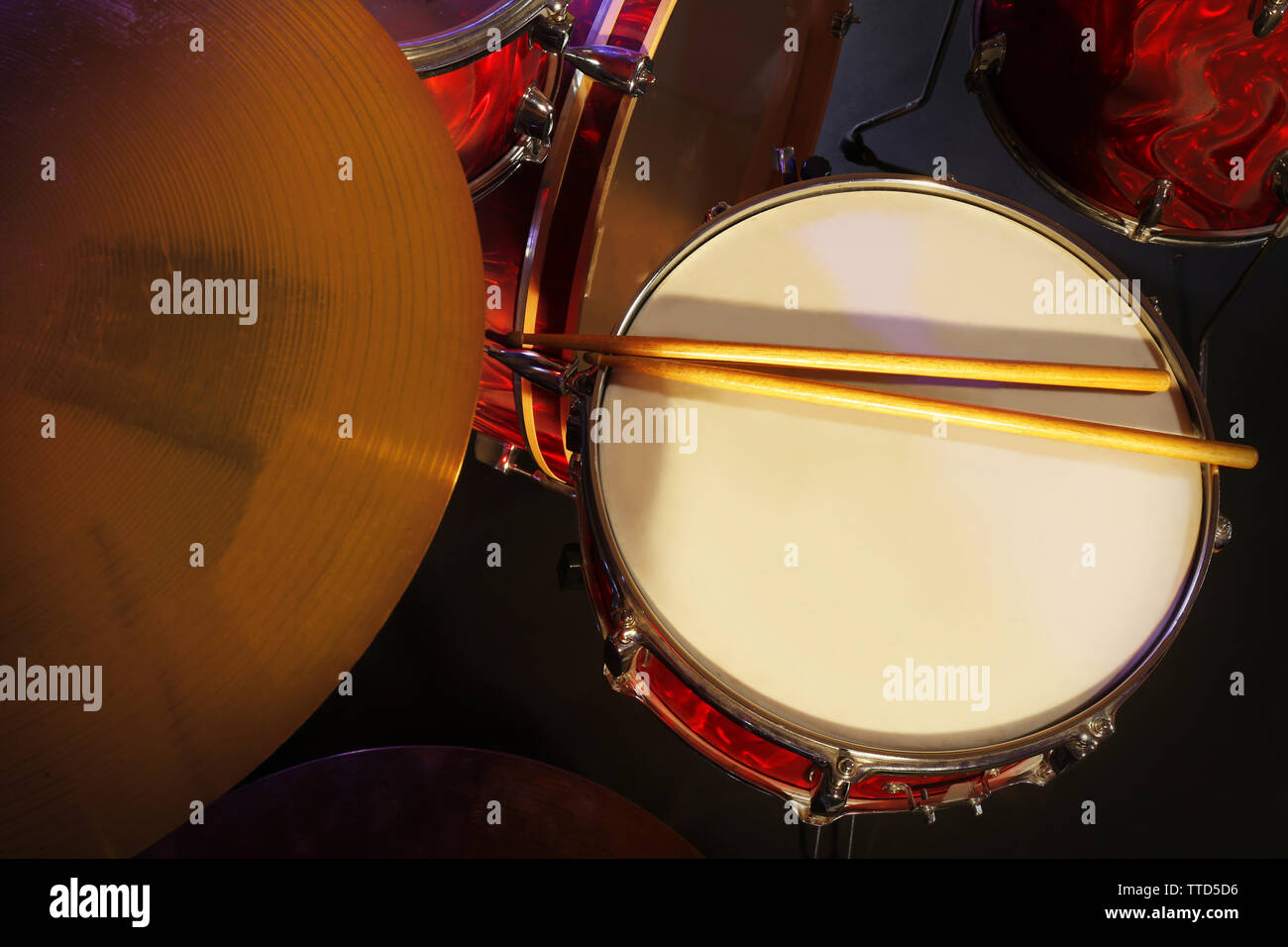 Drums set and sticks, close-up Stock Photo - Alamy