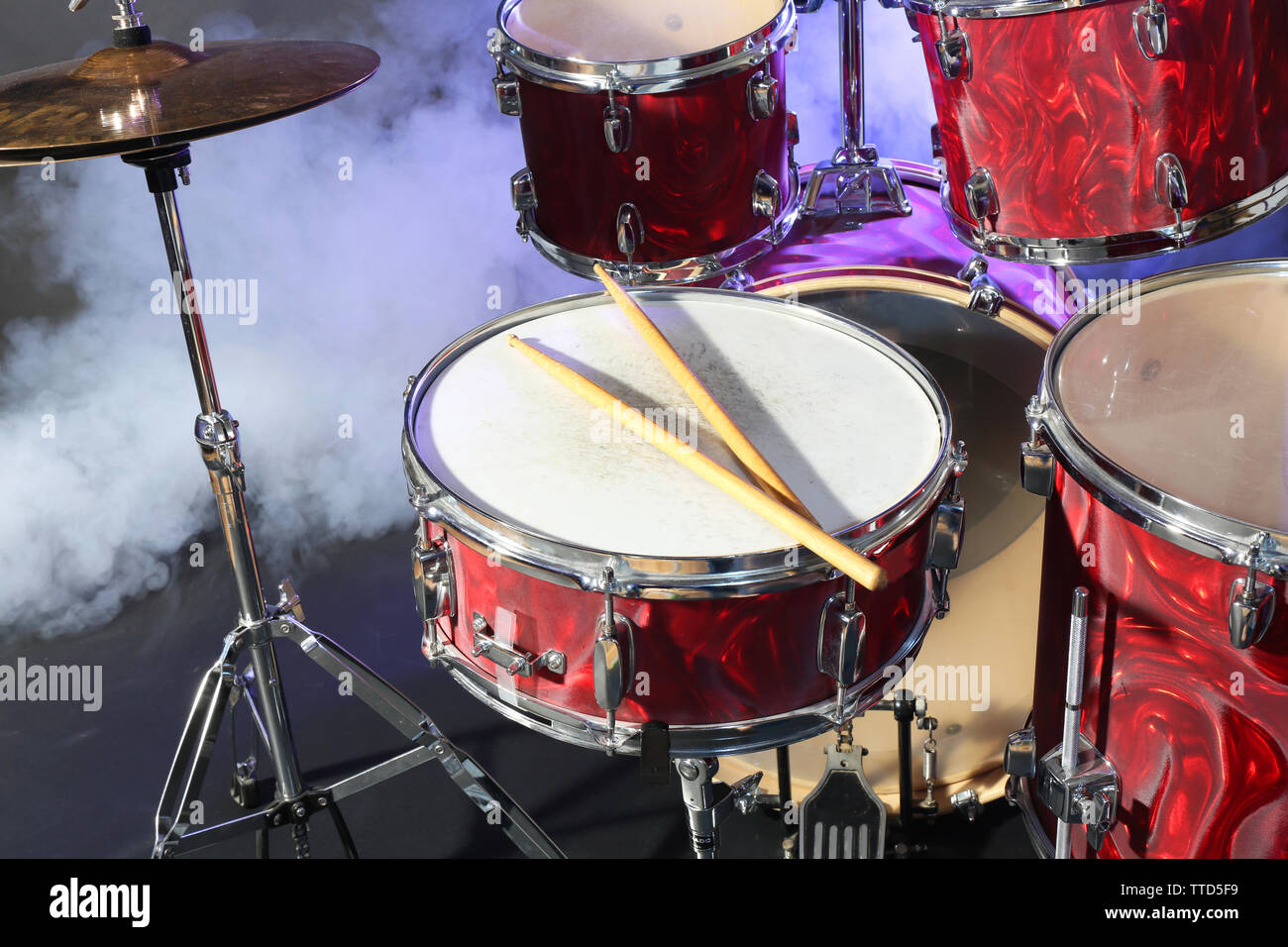 Drums set and sticks, close-up Stock Photo - Alamy