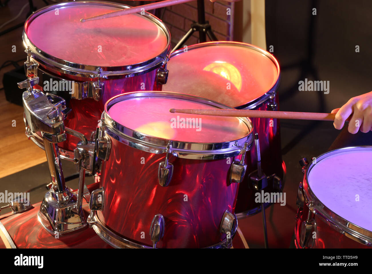 Drums set and sticks, close-up Stock Photo - Alamy
