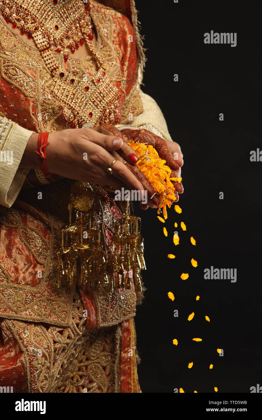 Newlywed couple performing traditional ritual Stock Photo - Alamy