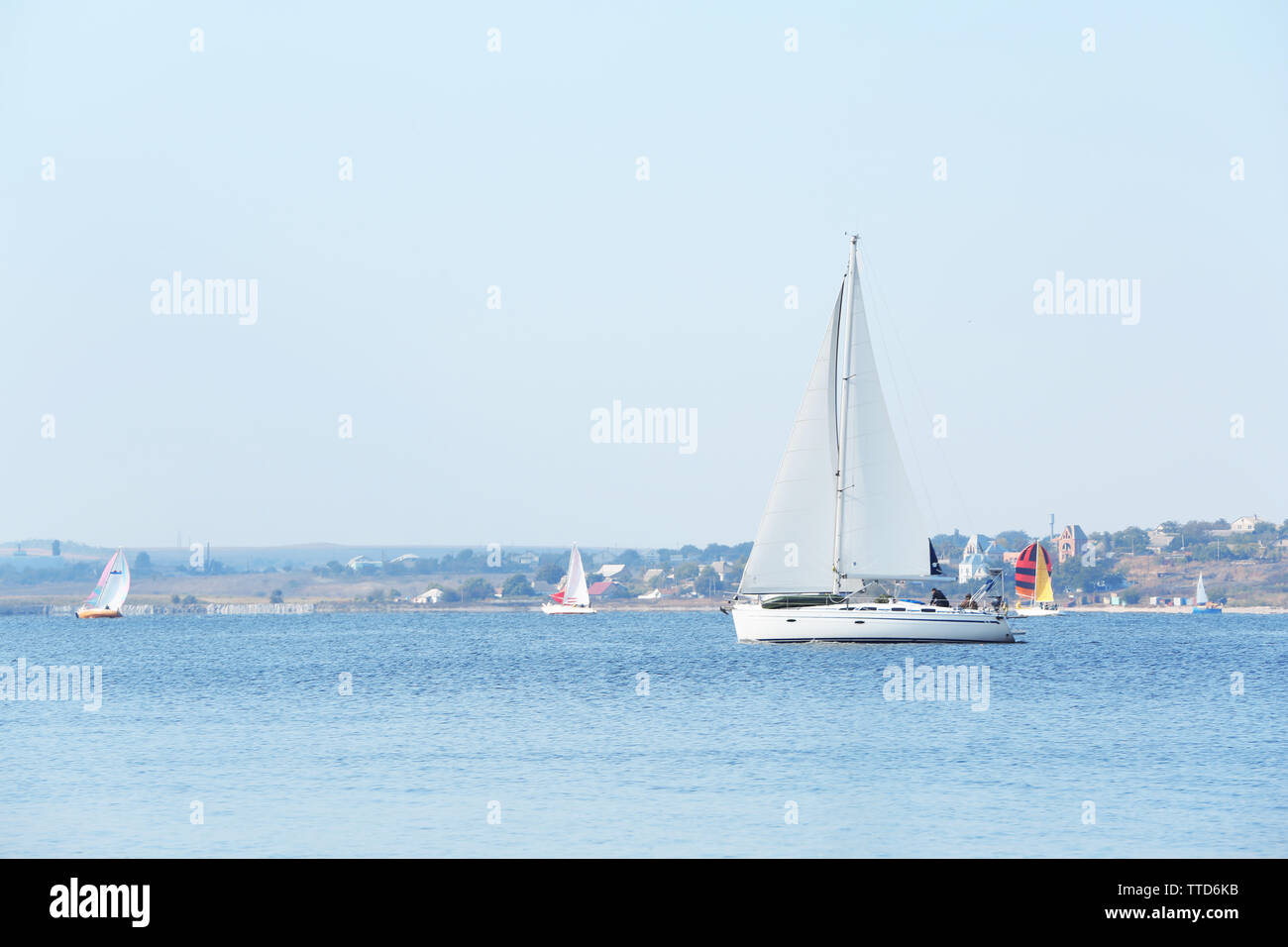 Sailing yacht on river Stock Photo - Alamy