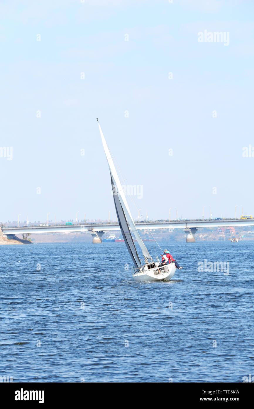 Sailing yacht on river Stock Photo - Alamy