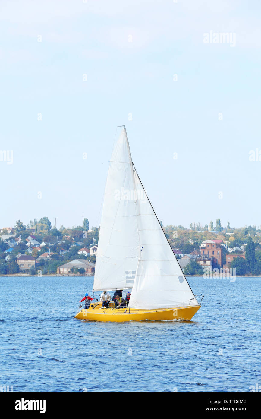 Sailing yacht on river Stock Photo - Alamy