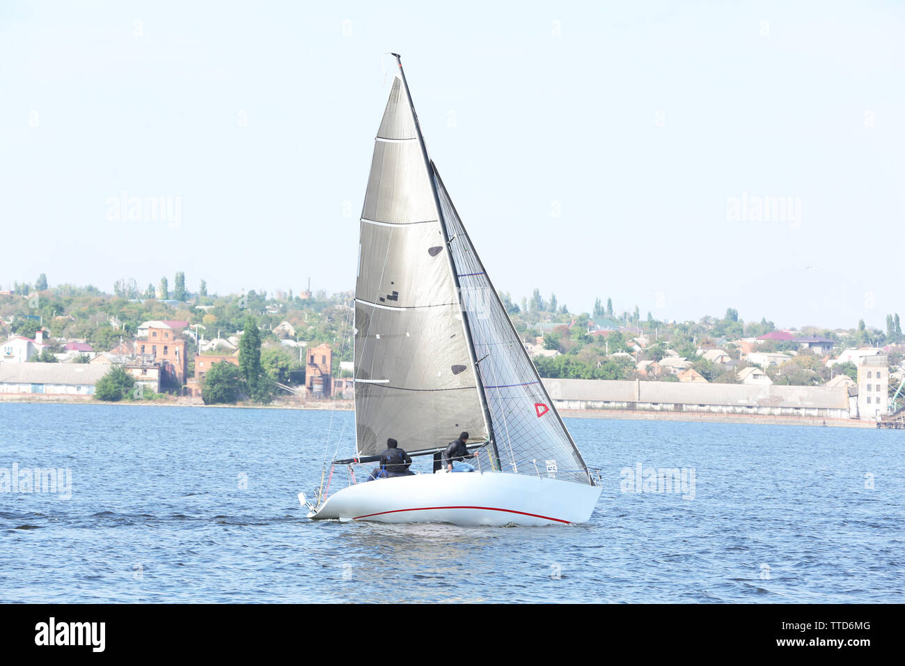Sailing yacht on river Stock Photo - Alamy