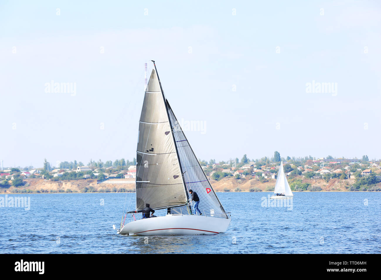 Sailing yacht on river Stock Photo - Alamy