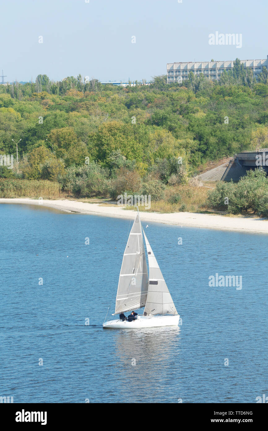 Sailing yacht on river Stock Photo - Alamy