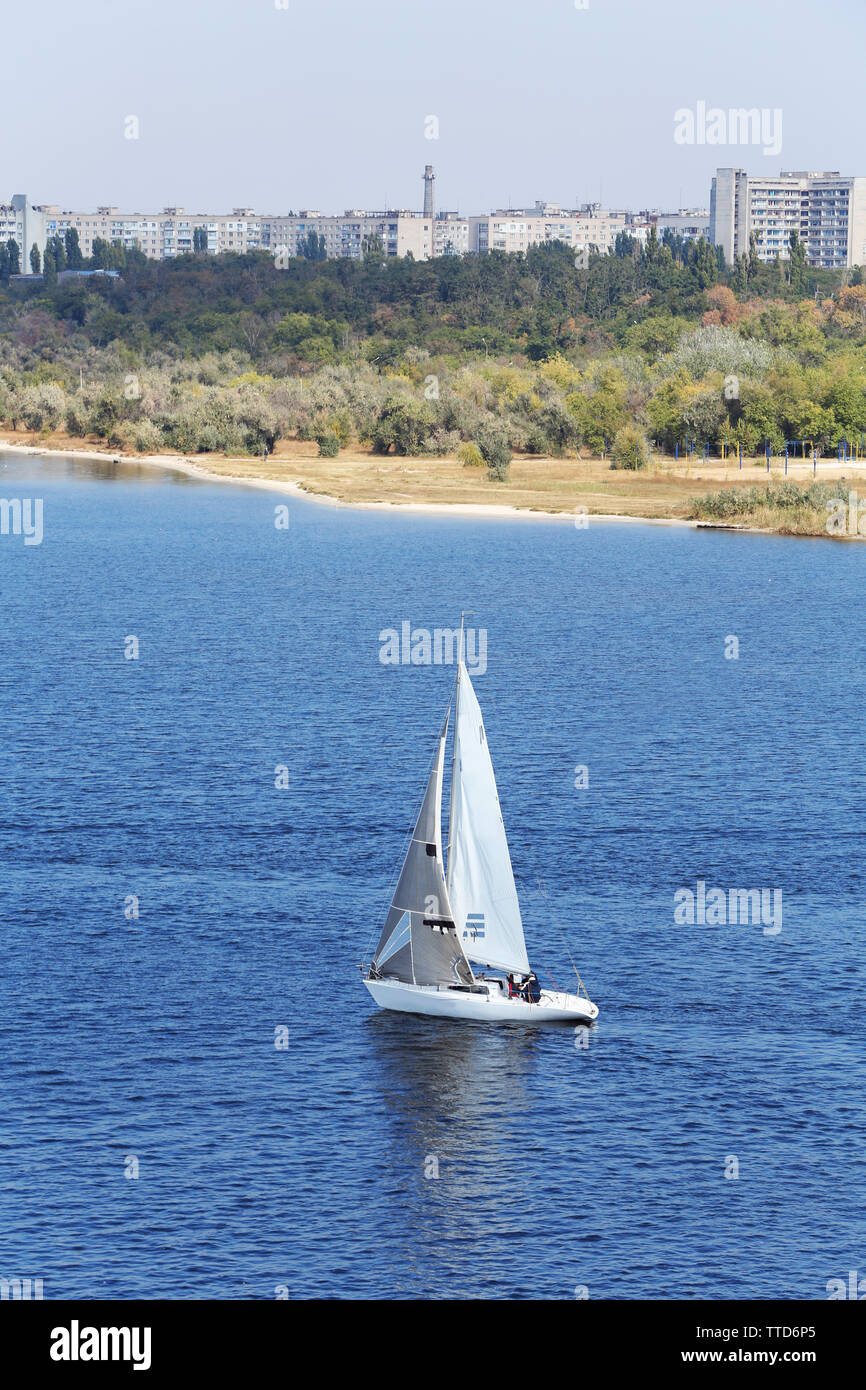 Sailing yacht on river Stock Photo - Alamy