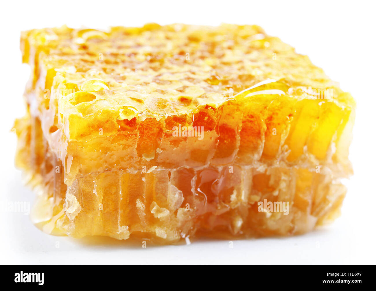 Honeycomb isolated on white Stock Photo - Alamy