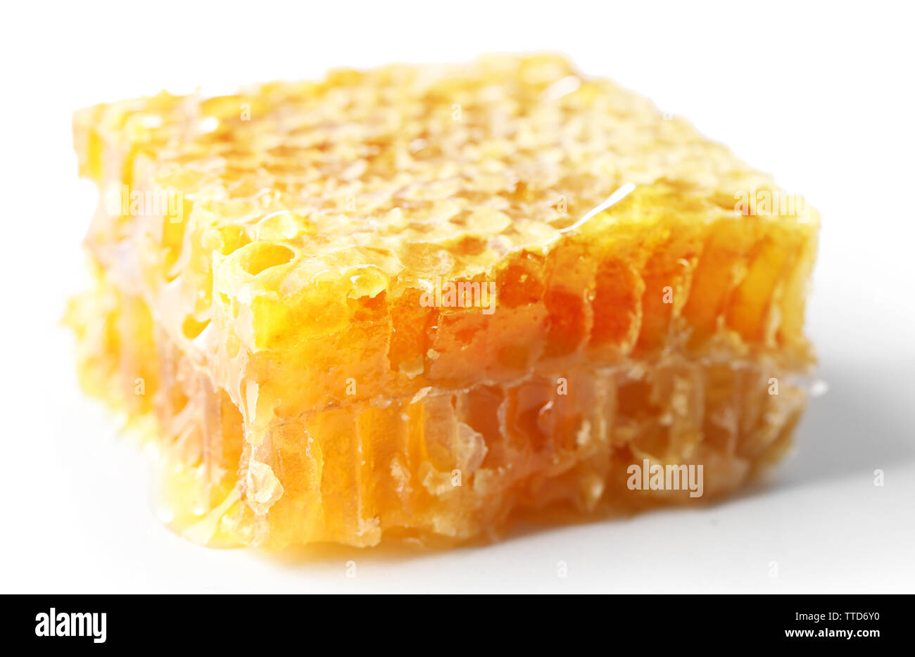 Honeycomb isolated on white Stock Photo - Alamy