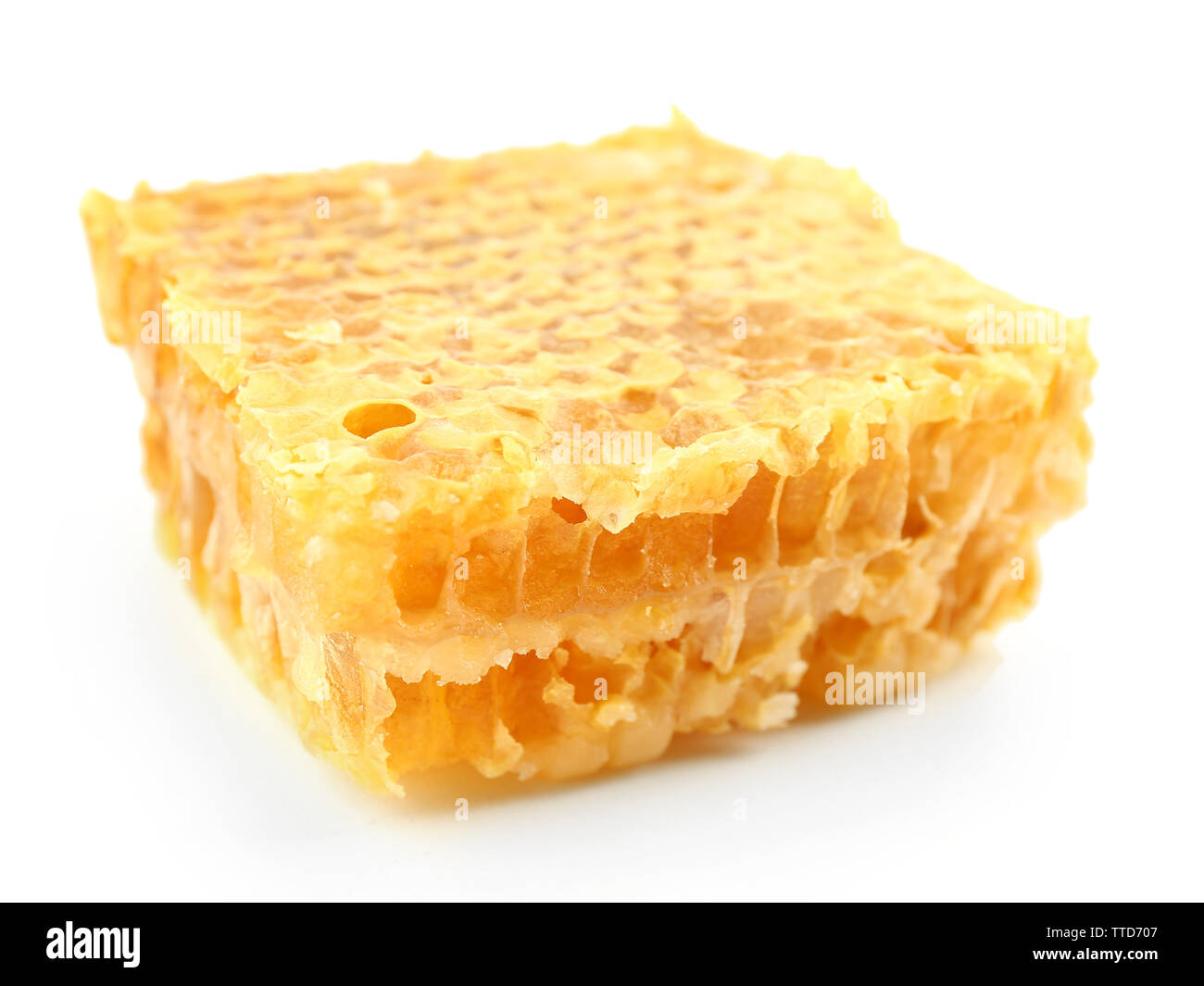 Honeycomb isolated on white Stock Photo - Alamy