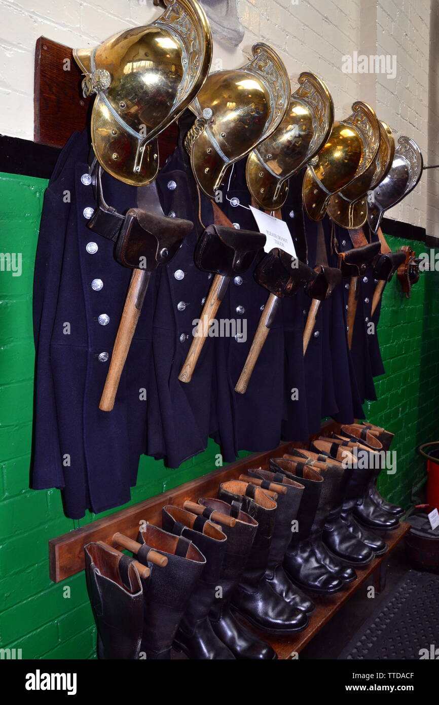 Antique firefighters' helmets and axes. The Greater Manchester Fire ...
