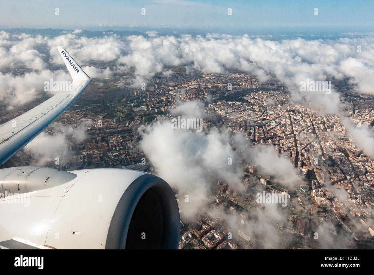 view showing the jet engine and wing tip of a ryanair passenger Boeing ...