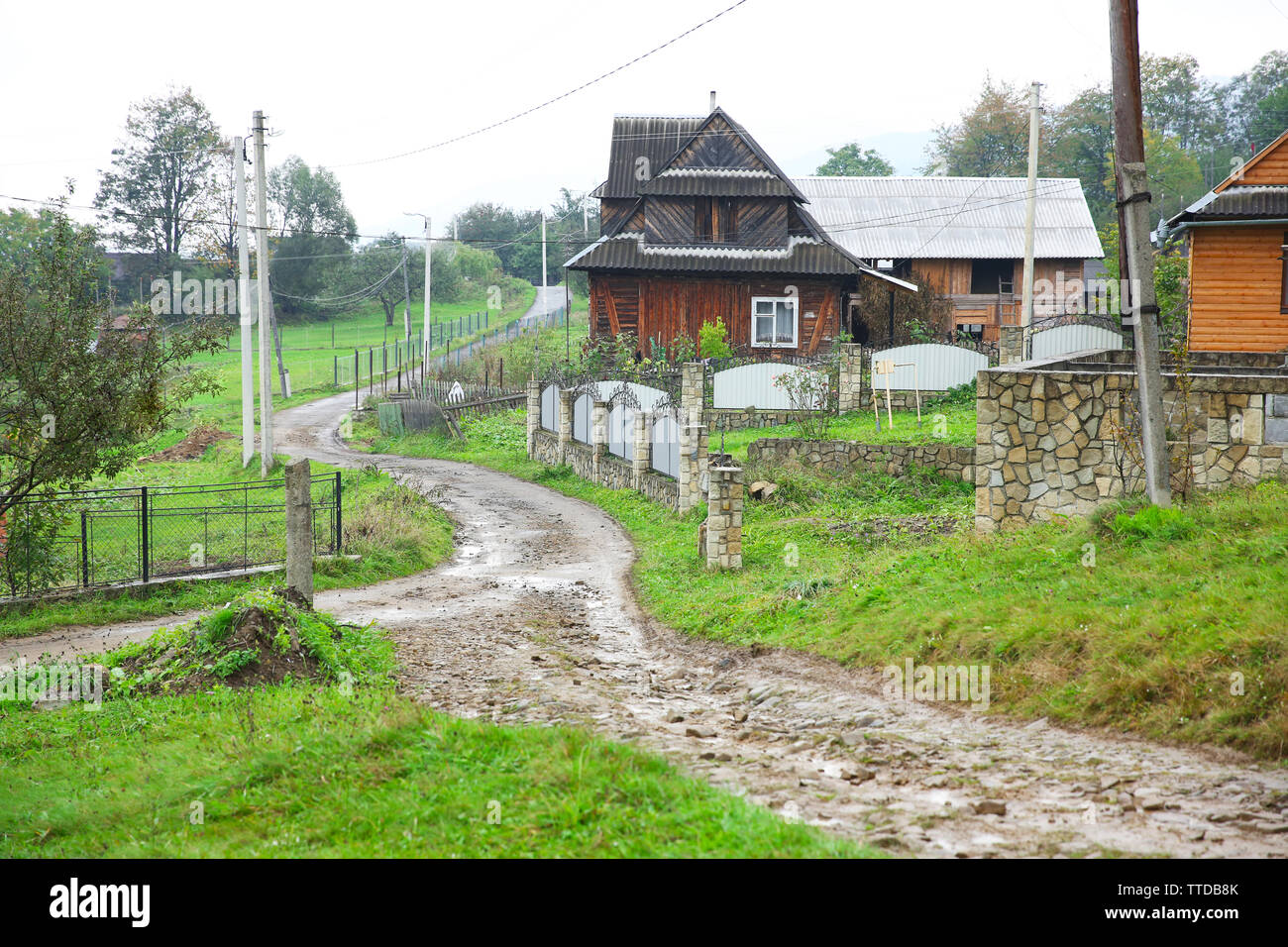 Landscape of village in mountains Stock Photo - Alamy