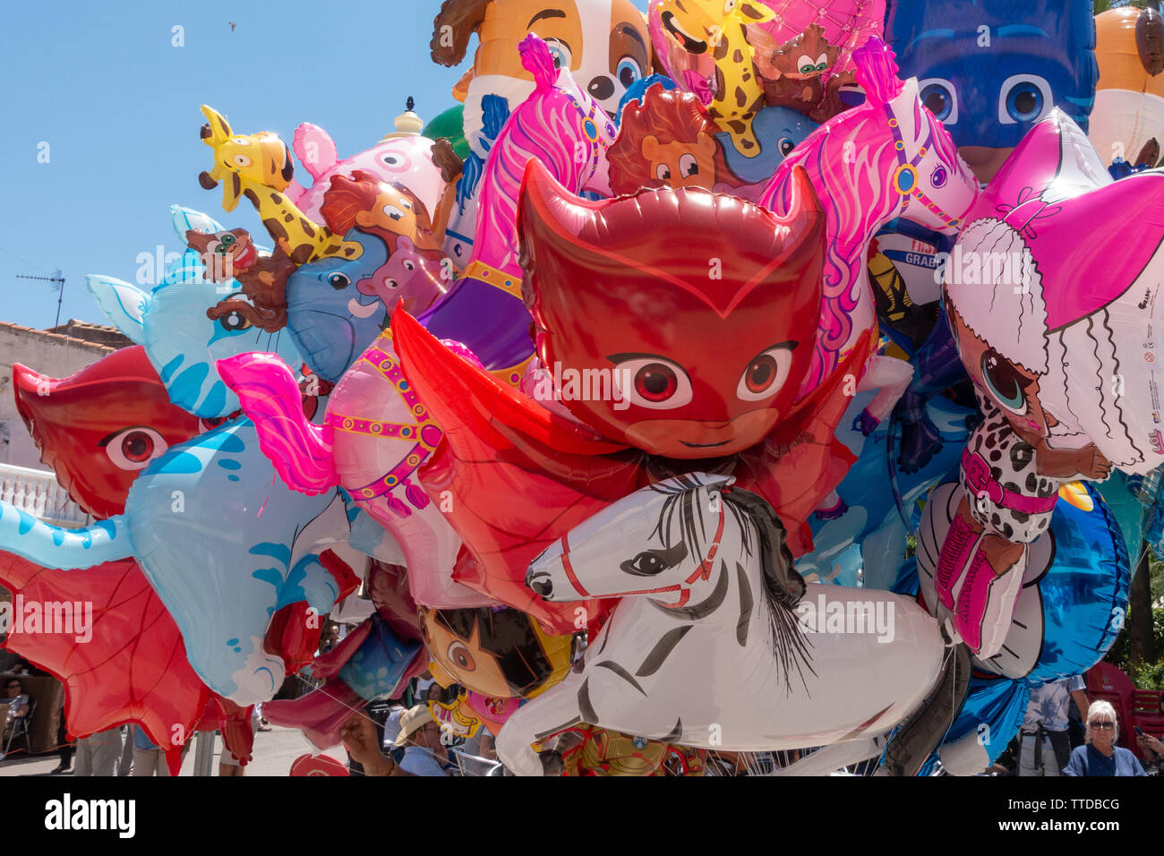 A display of childrens helium filled cartoon foil balloons Stock Photo ...